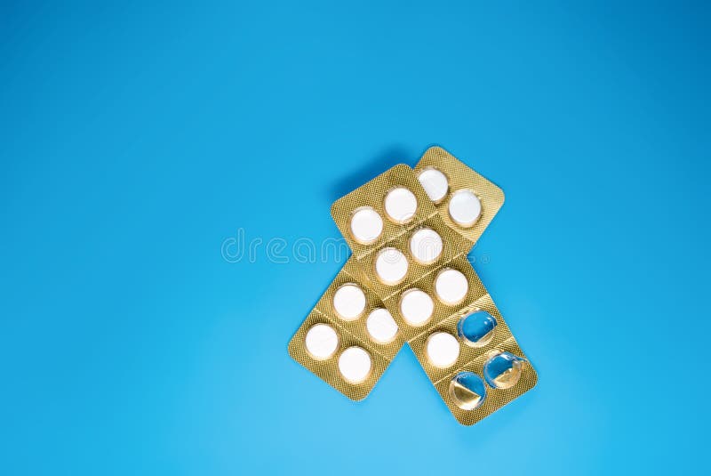 One Open White Pill Pack and One Sealed Packet with a Blue Back Stock ...