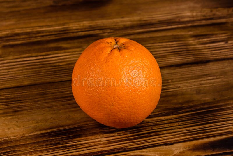 One Orange Fruit on a Wooden Table Stock Image - Image of market ...