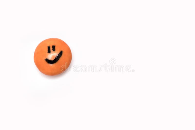 Smiley of the Round Chocolate Candies on a Wooden Board Stock Photo ...