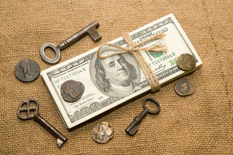 One Pack of Dollars, Coins and Keys on an Old Cloth Stock Photo - Image ...