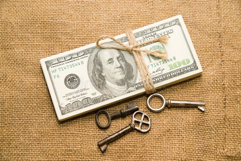 One Pack of Dollars and Keys on an Old Cloth Stock Photo - Image of ...