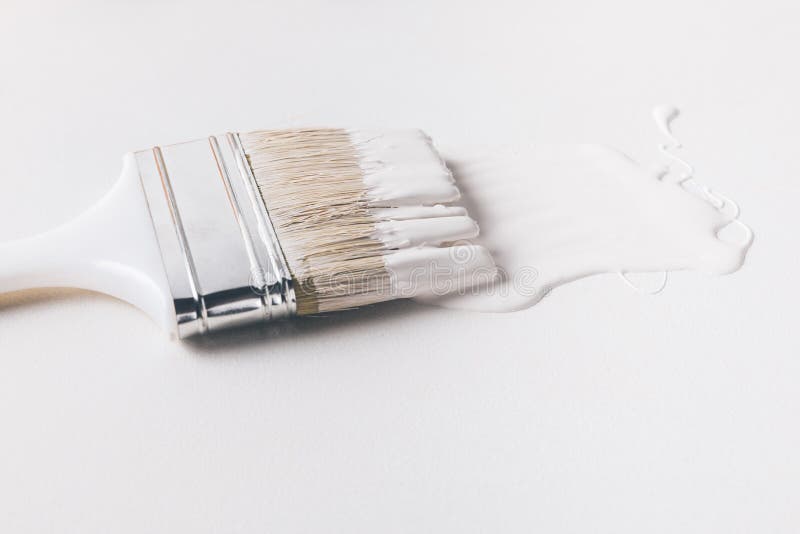 One Paint Brush in White Paint on Surface Stock Image - Image of brush ...