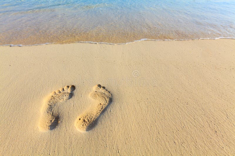 One Pair Footstep on the Beach Stock Image - Image of foam, mark: 49755915