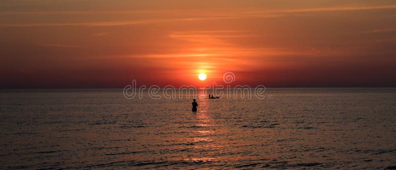 One Person, One Boat, One Sunset, One Beautiful Image Stock Photo ...