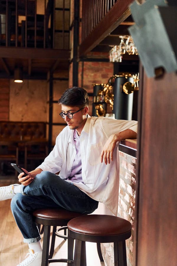 One Person. Man in Casual Clothes Sitting in the Pub Stock Photo ...