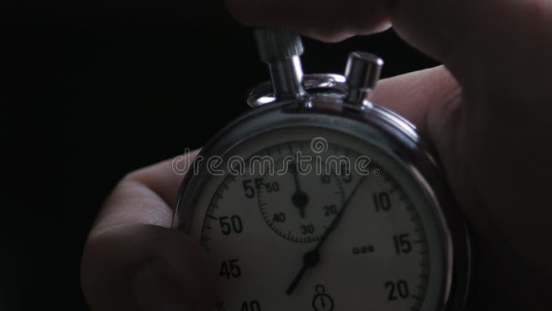 One Person Starting Up a Stopwatch at Black Background Stock Video ...