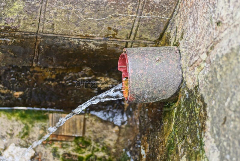 One Pipe with Flowing Water of a Spring Stream Stock Photo - Image of ...