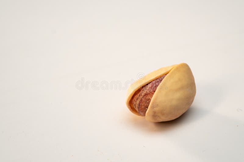 One Pistachio on a White Isolated Background Stock Image - Image of ...