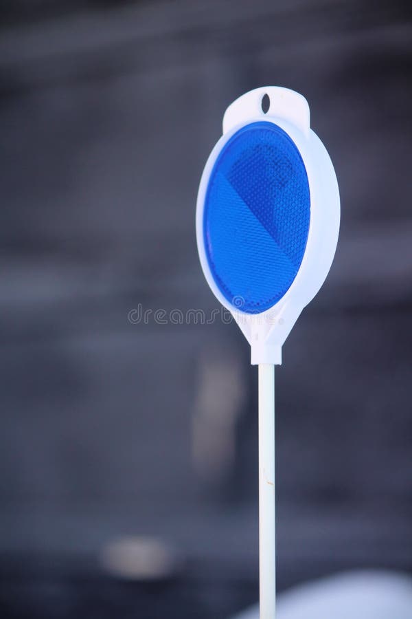 Plastic Blue Reflector Surrounded in White Plastic on Right Side of ...