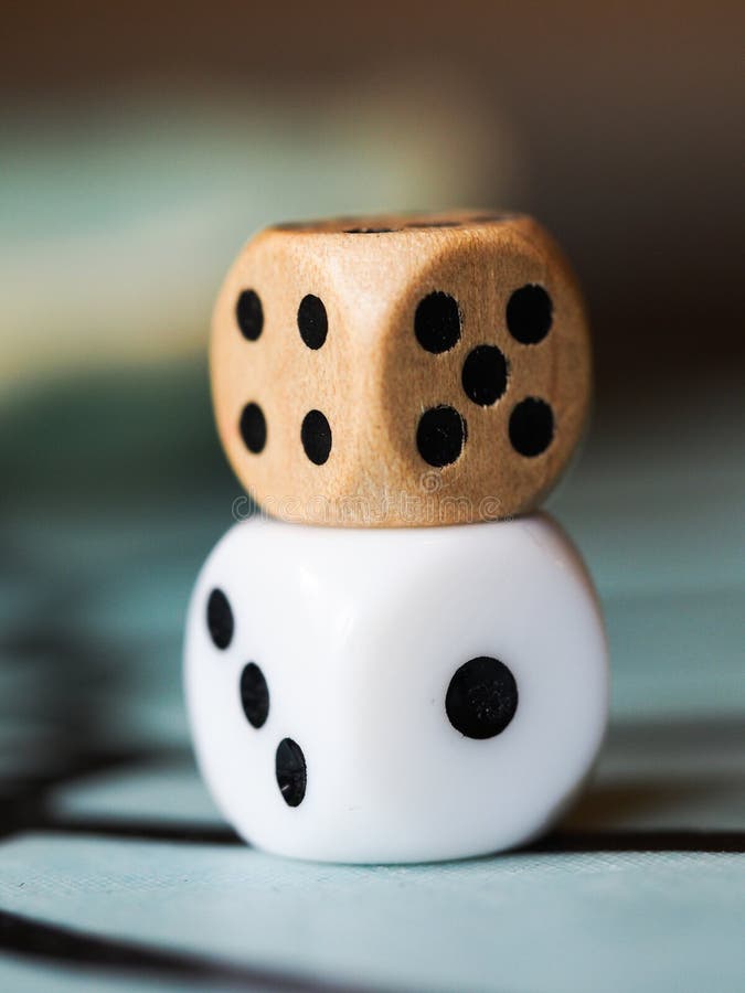 One Plastic and One Wooden Die Stock Image - Image of gambling, sides ...