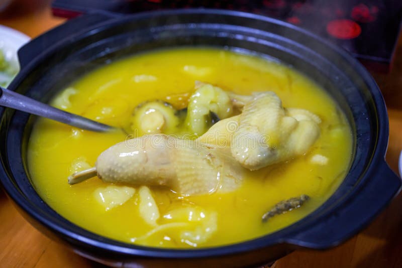 One Pot Golden Delicious Abalone Fish Maw Chicken Stock Photo - Image ...