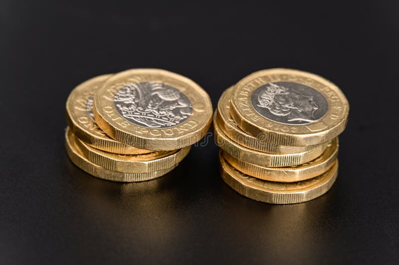 One Pound Coins Currency on a Black Background Editorial Photography ...