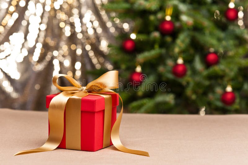One Present with Gold Ribbon Stock Photo - Image of silver, symbol ...