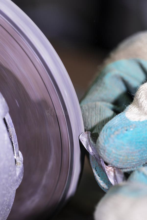 One Professional Fitter Man Using Paste for Metal Polishing Machine ...