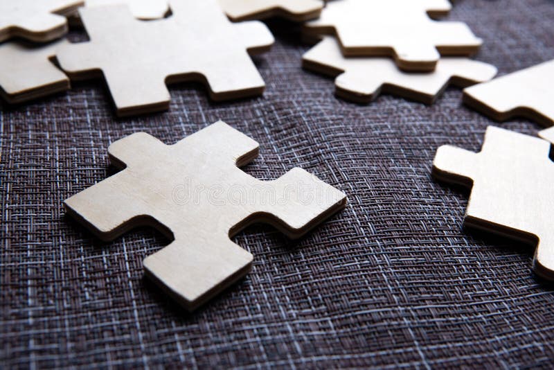 One Puzzle Piece Against the Background of Other Pieces Stock Photo ...