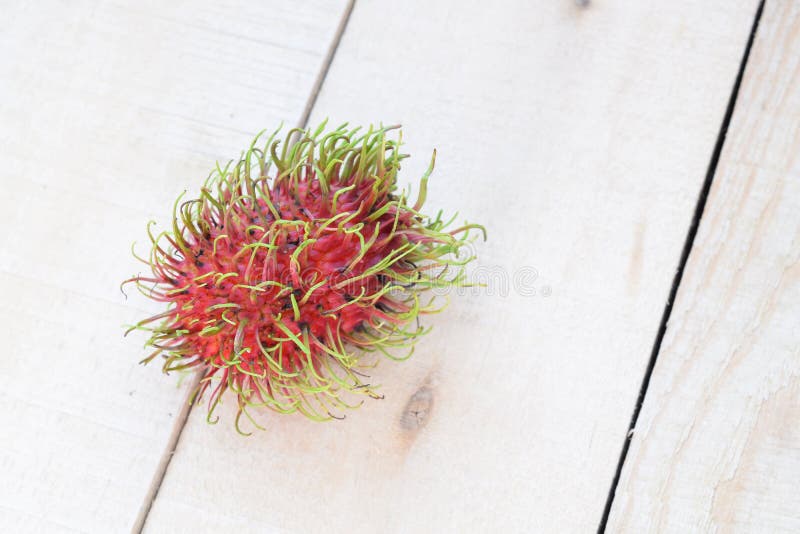 One Rambutan on Wooden Panels Stock Image - Image of nature, eating ...