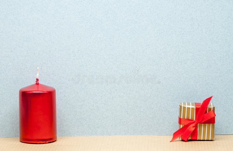 One Red Candle and Small Gift Stock Photo - Image of happy, cozy: 80900066