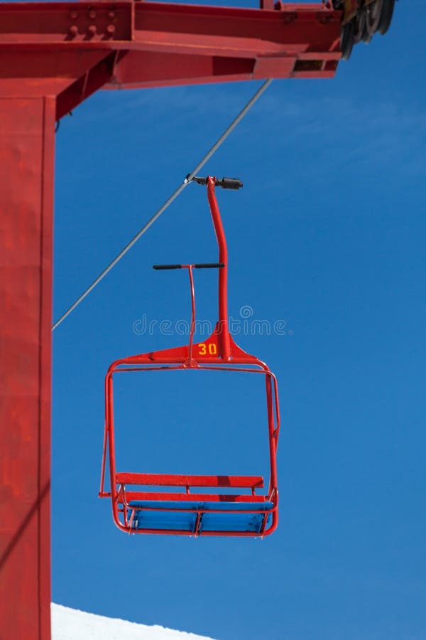 One red chair of ski lift stock image. Image of adrenaline - 70426035