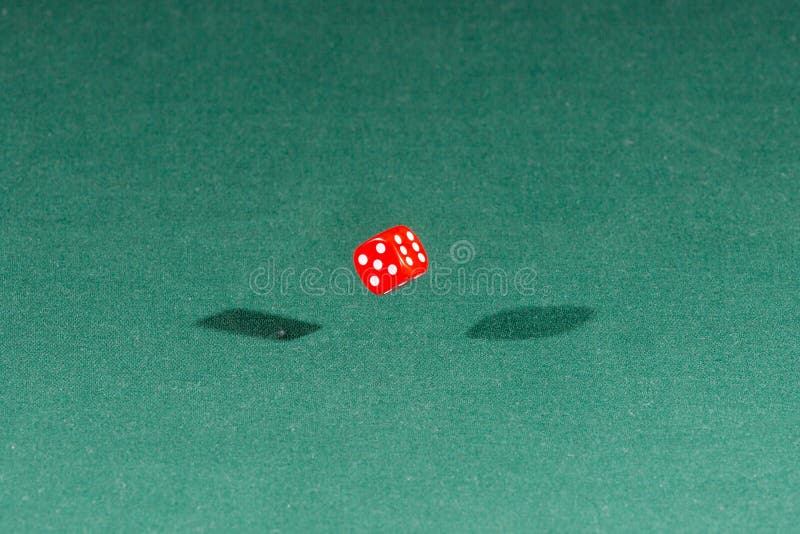 One Red Dice Falling on a Green Table Stock Photo - Image of money ...