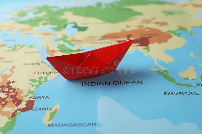 One red paper boat on map stock image. Image of tourism - 239963891
