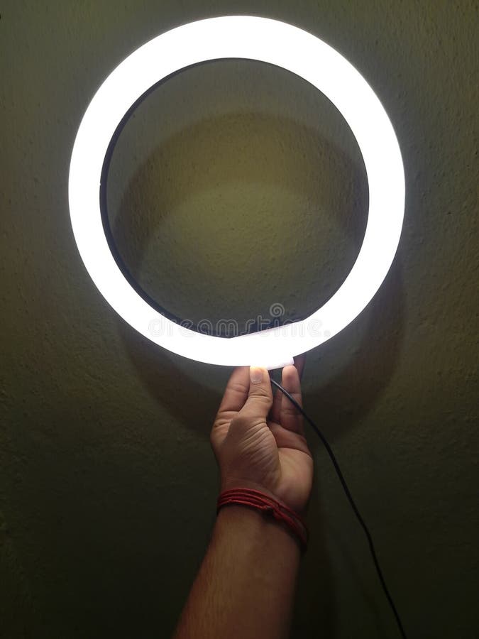 One Ring Light Was Holding a Hand Stock Photo - Image of light, hand ...
