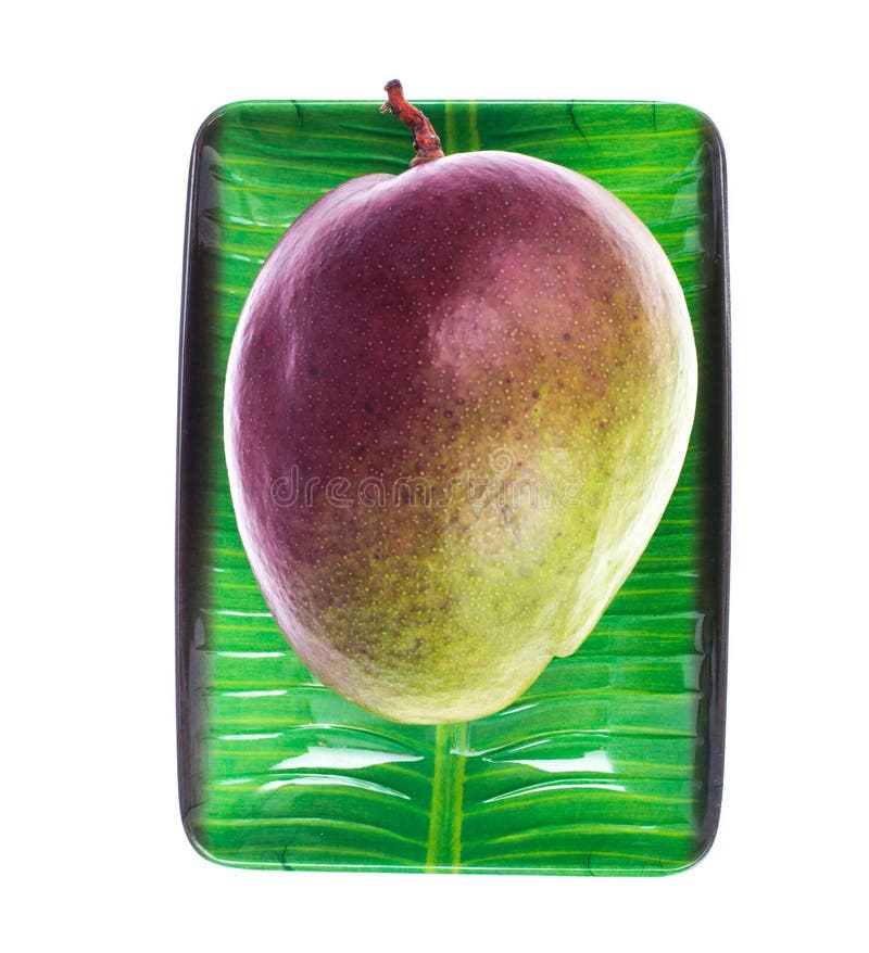 One ripe mango on plate stock image. Image of exotic - 114495675