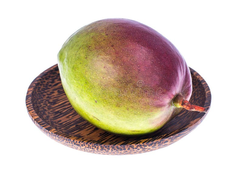 One ripe mango on plate stock image. Image of fresh - 114495691