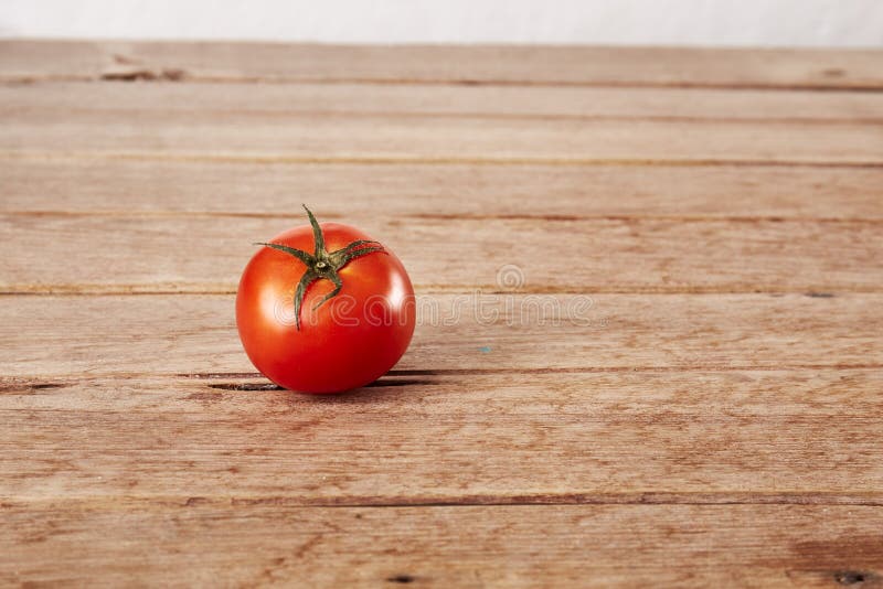 One Ripe Tomato on a Decorative Board. Stock Image - Image of health ...
