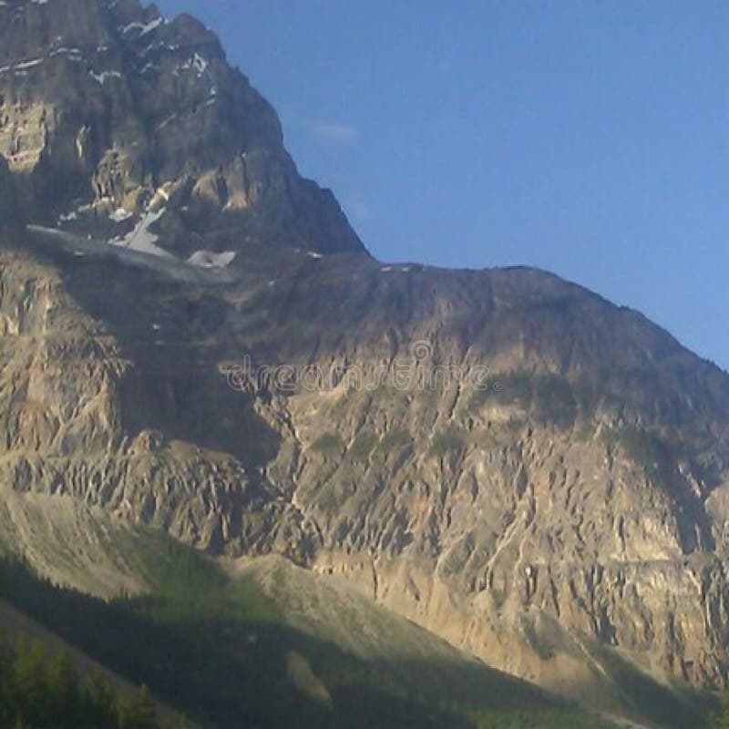 Huge mountain side stock image. Image of rockies, huge - 147006521