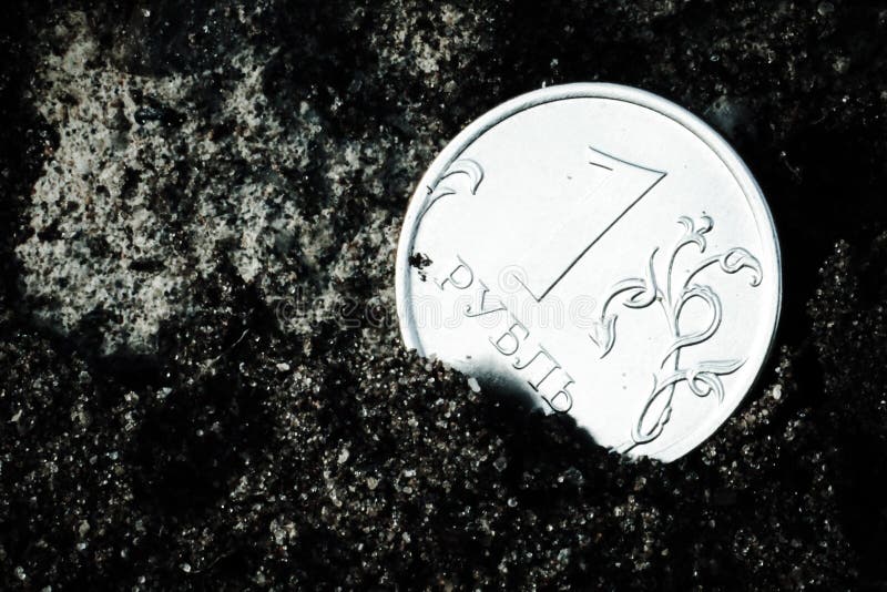 One ruble on the ground. stock photo. Image of metal - 134714890