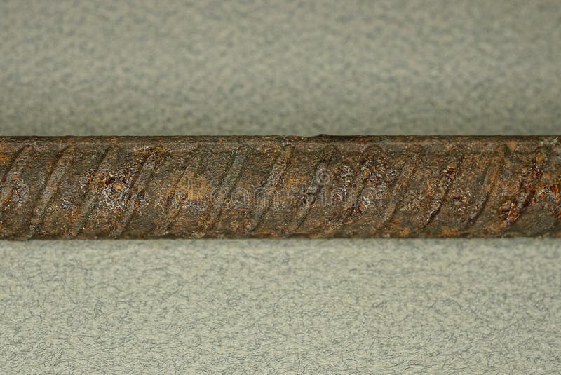 One Rusty Steel Rod Lies a Gray Table Stock Photo - Image of surface ...