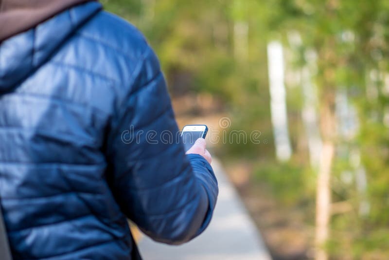 One Man with His Mobile Smart Phone Searching for Reception Signal in ...