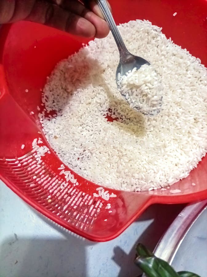 One Scoop of Rice on Top of the Rice Bin with Red Color Stock Photo ...