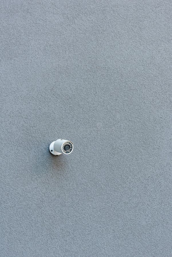 One Security Camera on Grey Brick Wall Security Stock Image - Image of ...