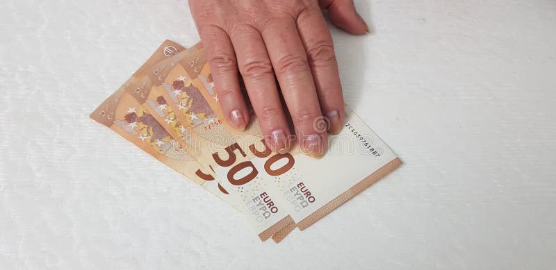 One Senior Female Hand on 50 Euro Stock Image - Image of hands ...