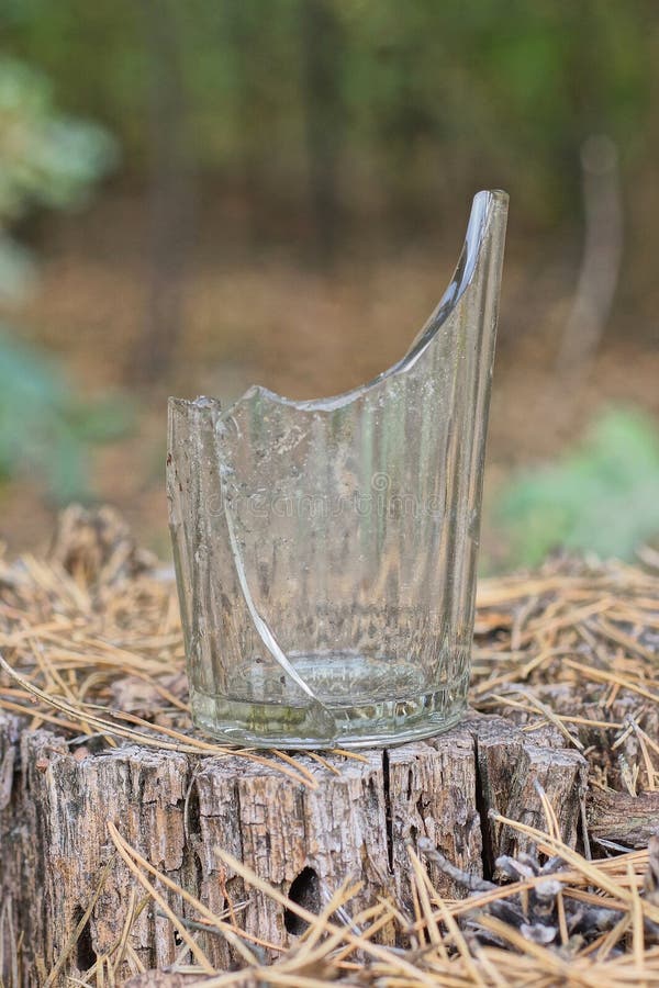 One Sharp White Piece of a Broken Glass Bottle Stock Image - Image of ...