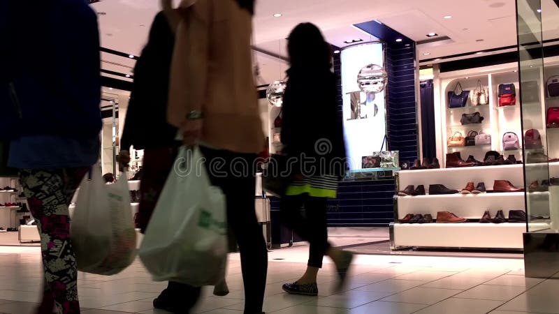One side of shoes store stock video. Video of active - 65446537