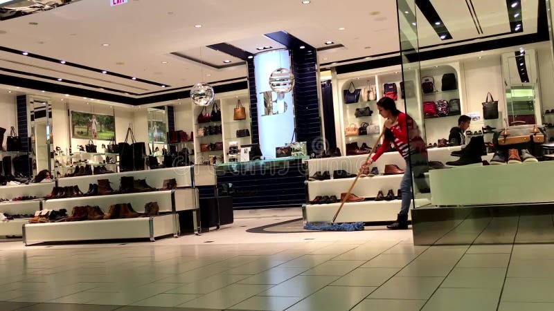 One side of shoes store stock footage. Video of sale - 65448274