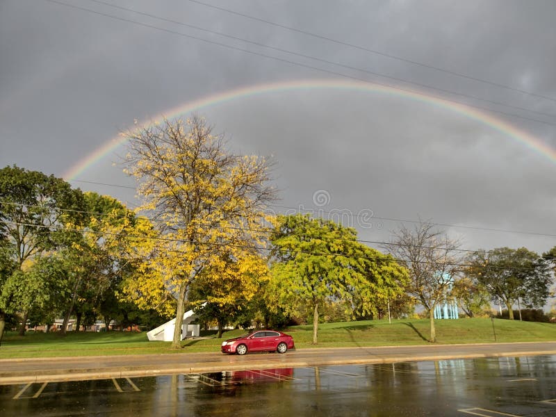 From One Side To the Other a Full Rainbow is Seen Stock Photo - Image ...