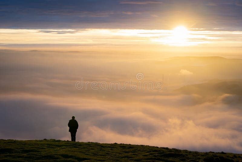 One Single Anonymous Man Standing on Mountain Alone Watching Sunrise ...