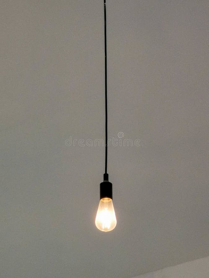 Single Lightbulb Surrounded by Darkness Stock Photo - Image of glass ...