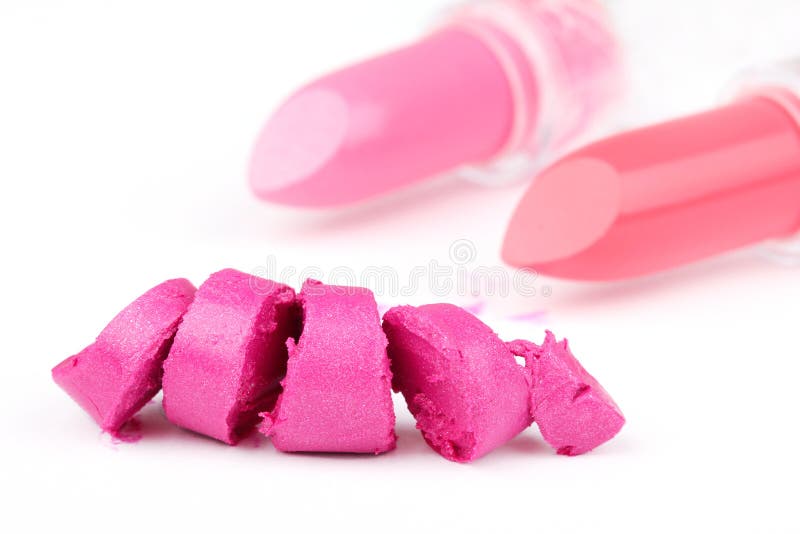 One Sliced Lipstick and Two Whole Lipsticks Stock Photo - Image of ...