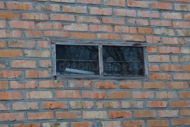 One Small Rectangular Old Window on a Brown Bricks Wall Stock Photo ...