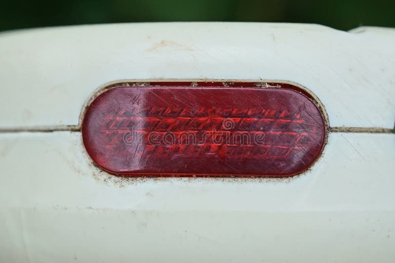 Red Reflector on a White Plastic Wall Stock Photo - Image of equipment ...