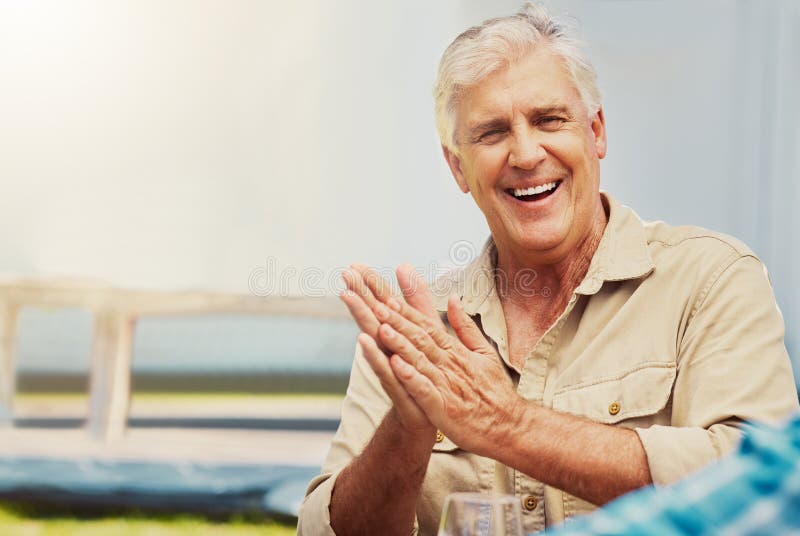 One Smiling Senior Caucasian Man Clapping While Enjoying Wine Tasting