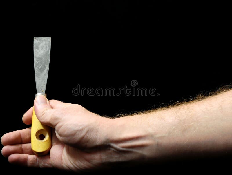One Spatula and a Hand stock image. Image of holding - 321965653