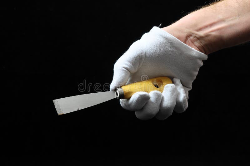 One Spatula and a Hand stock photo. Image of instrument - 34559602