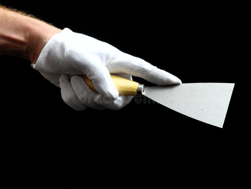 One Spatula and a Hand stock photo. Image of industry - 244728880