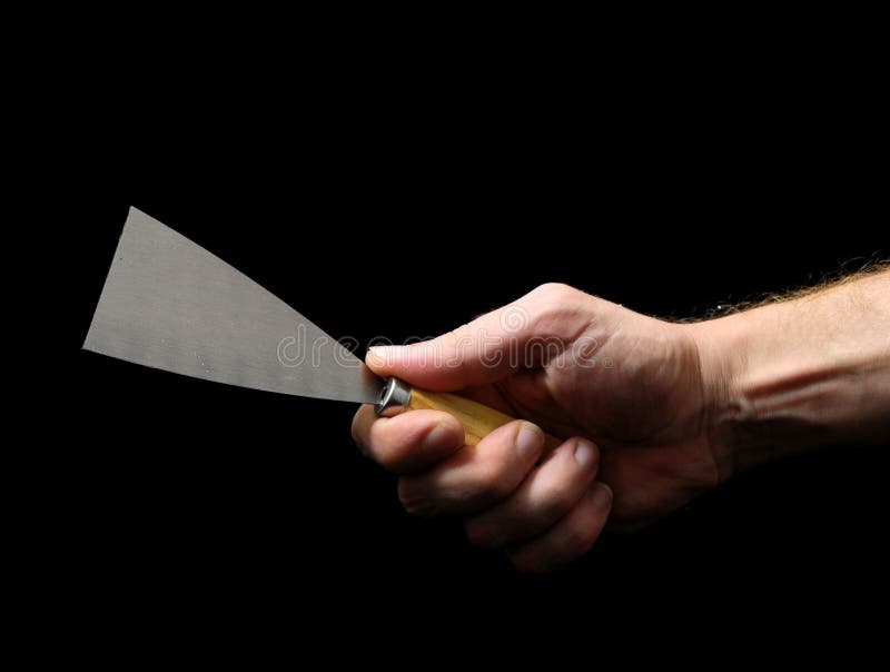 One Spatula and a Hand stock photo. Image of holding - 247434396