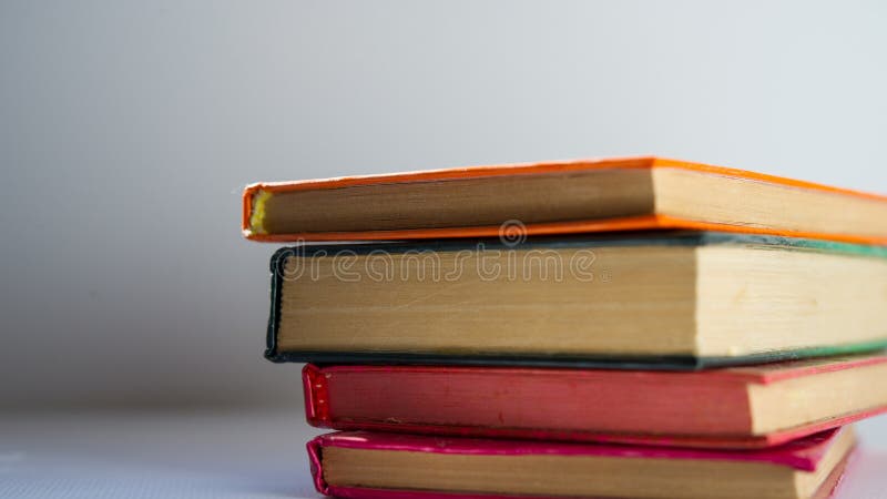 One Stack of Closed Books Lies on a Light Background Stock Image ...